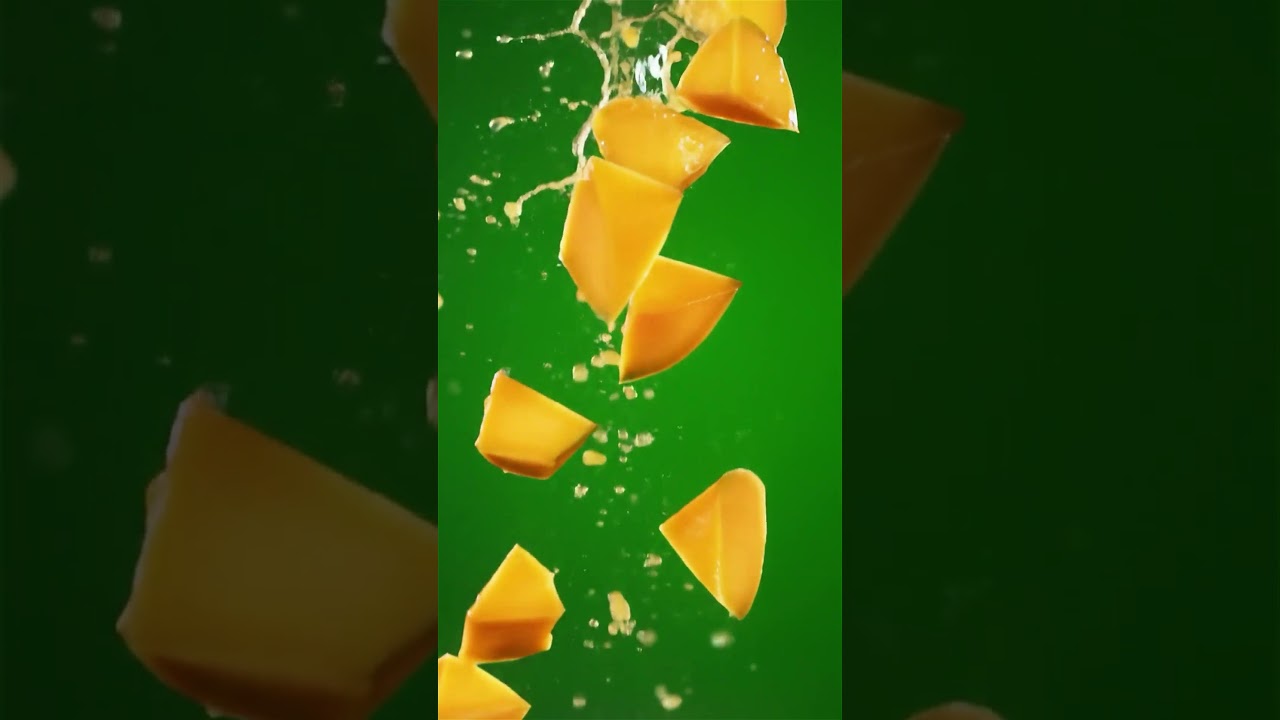 Mango slices falling 🥭💣 Pure Tropical Splash #mango #fruitexplosion #greenscreen #shorts