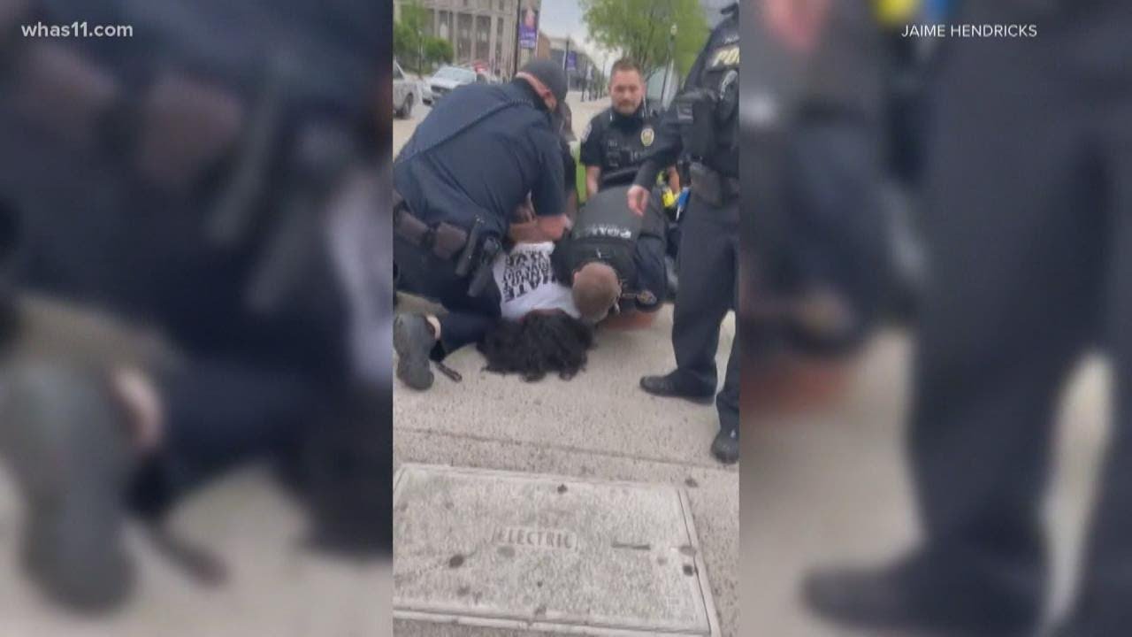 LMPD officer facing lawsuit after caught on camera punching man during arrest