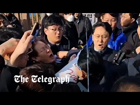 South Korea’s opposition leader stabbed in neck