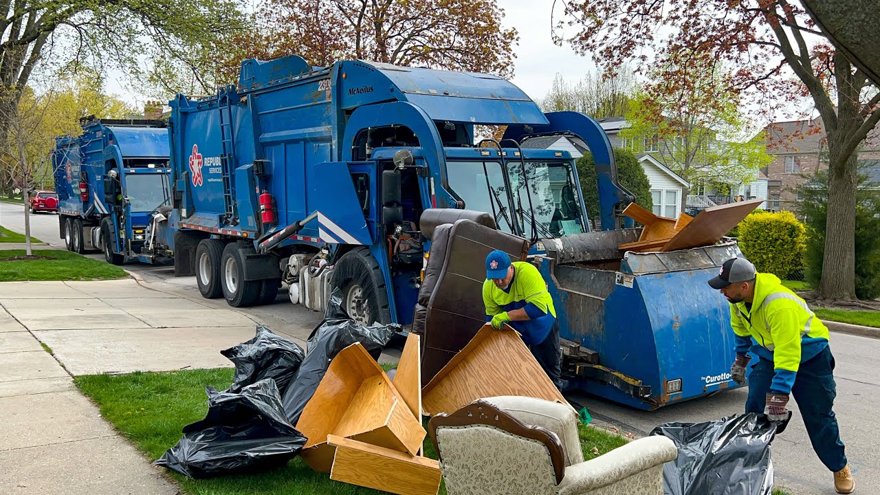 Republic Services Tag Teaming Front Loader Garbage Trucks Packing Bulk at the Spring Cleanup
