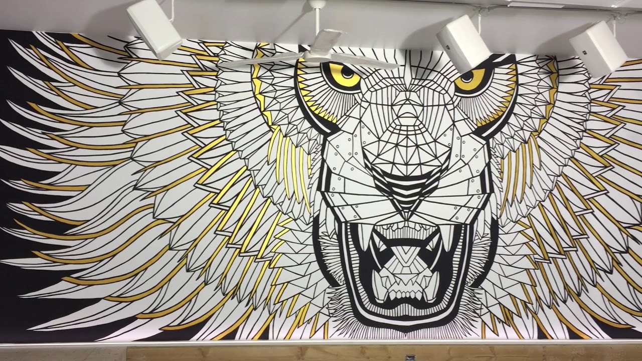 Timelapse of 30-foot fierce lion mural for Spin Society by Sandy and Steve Pell of Pellvetica