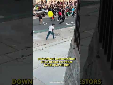 Downtown LA Protestors Build Barricade From Tables and Chairs