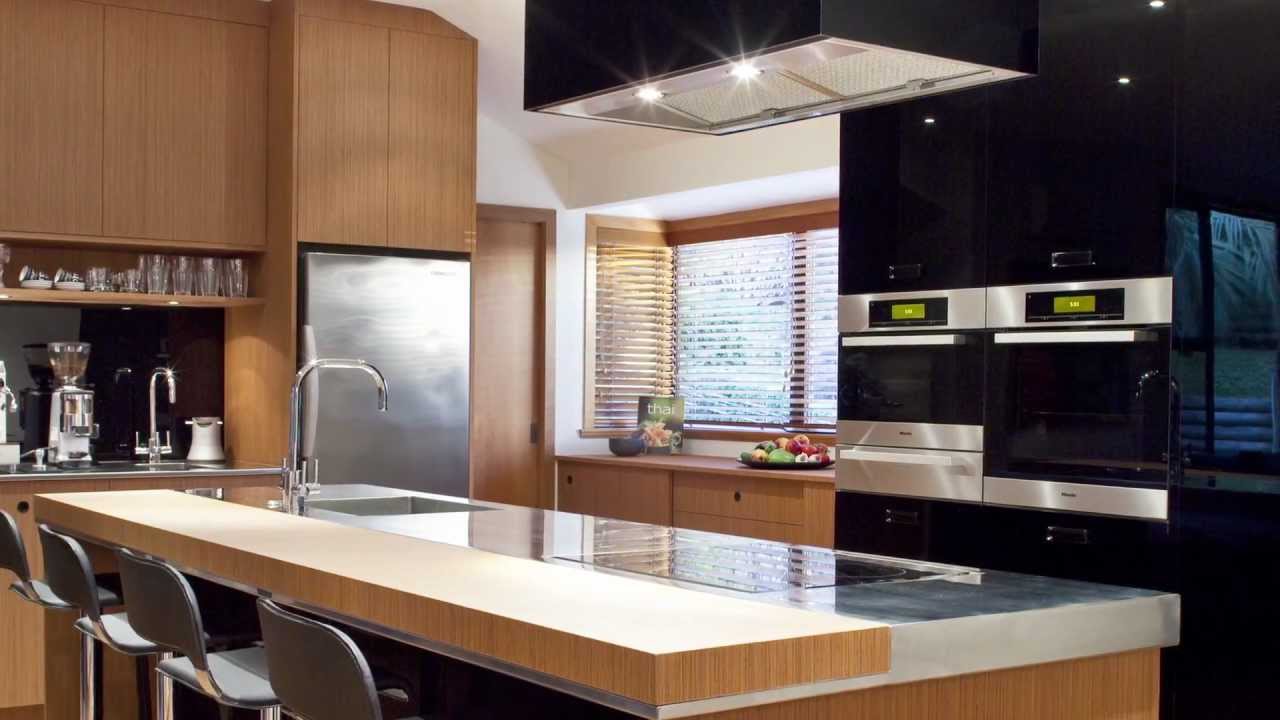 Renovated entertainer's kitchen combines sleek, modern surfaces with classic charm