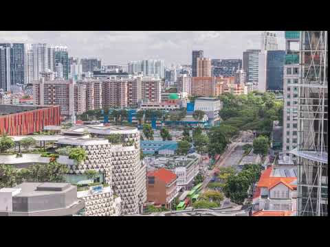 Singapore skyline with Victoria street and National Library aerial timelapse.