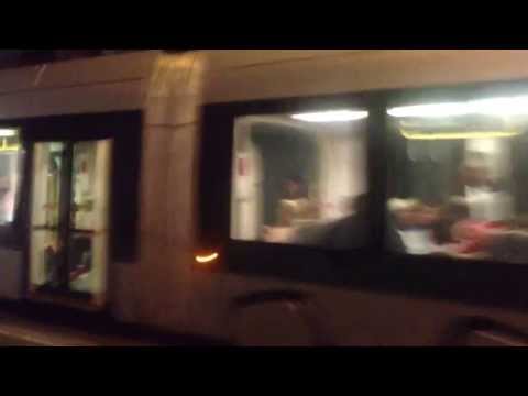 Nottingham tram moving down a hill