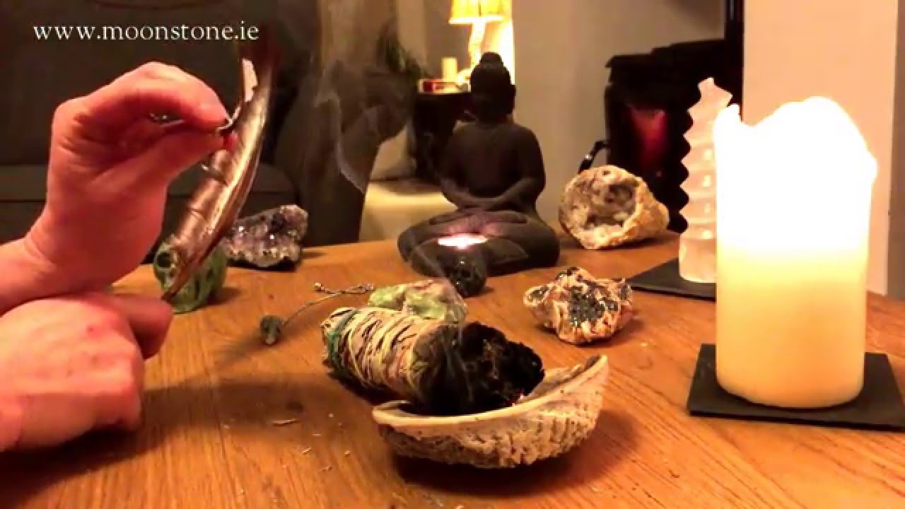How to use a sage smudge stick to cleanse crystals