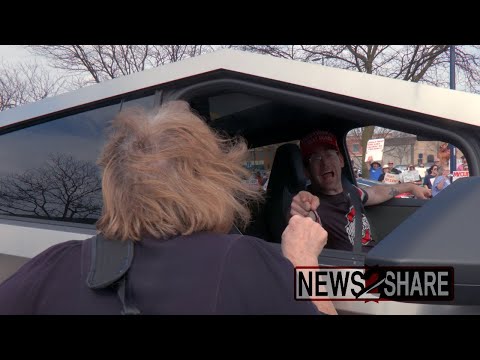 Anti-Elon Musk protesters face off with Trump supporters outside Tesla in Columbus, Ohio