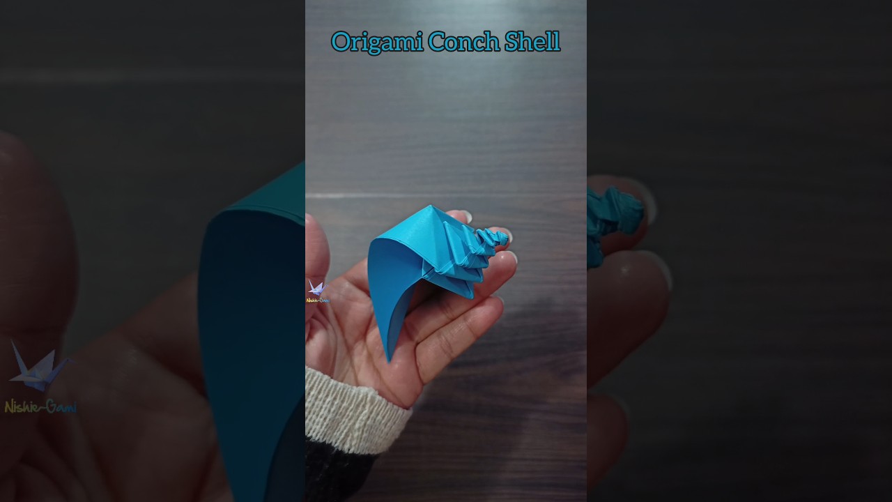 Express Origami: Quick Conch Shell Magic! 🐚✨