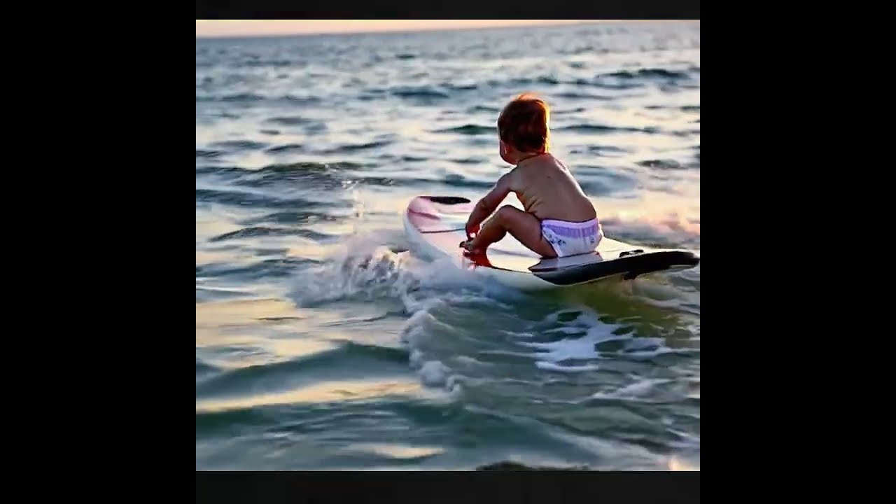 Surf’s Up, Baby! Riding Waves Like a Pro #baby #surfing #adorablemoments