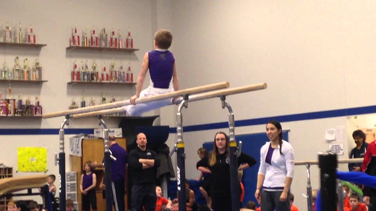 Mason on the P bars Level 5
