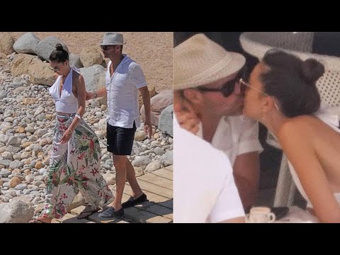 Ryan Seacrest and his influencer girlfriend Aubrey Paige pack on the PDA as they share a kiss