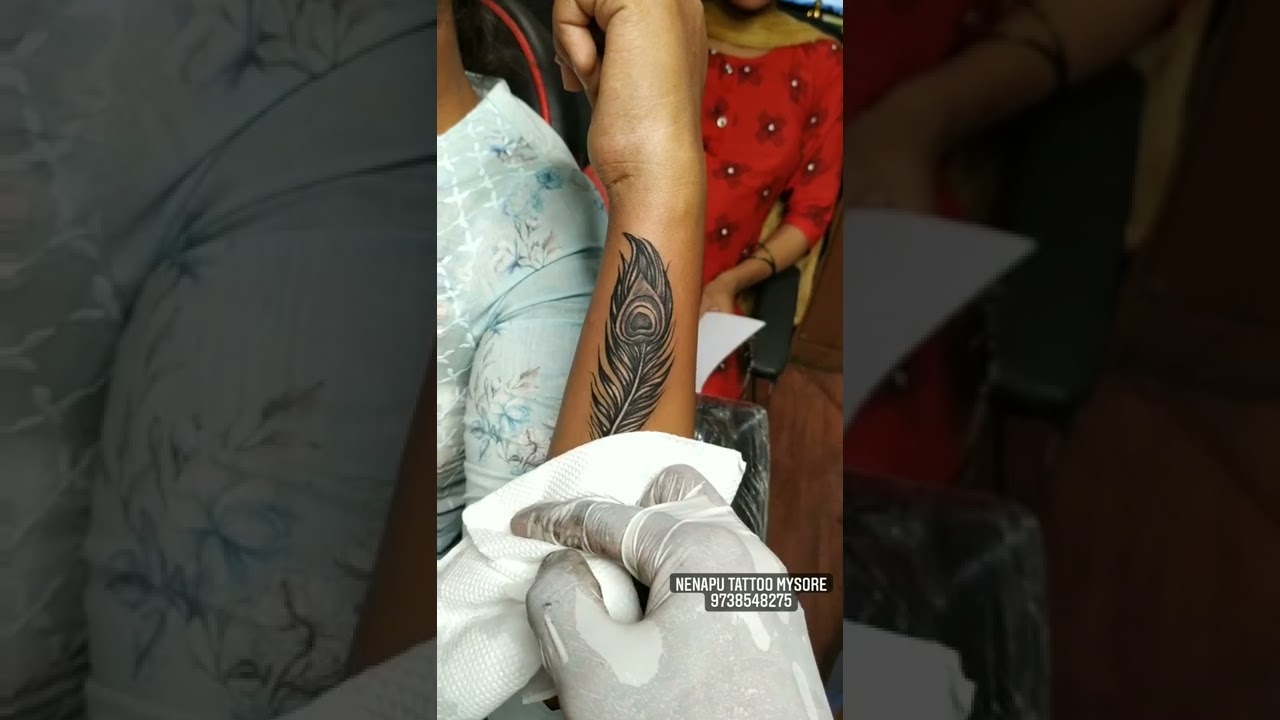 peacock feather tattoo napu_tattoo_mysoreTtoo artist manuBok ur Appointment Cnt No :9738548275