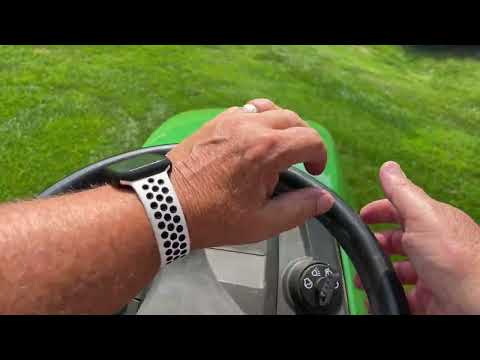 Papa Mows Stuff cuts the lawn with the John Deere X320 Tractor