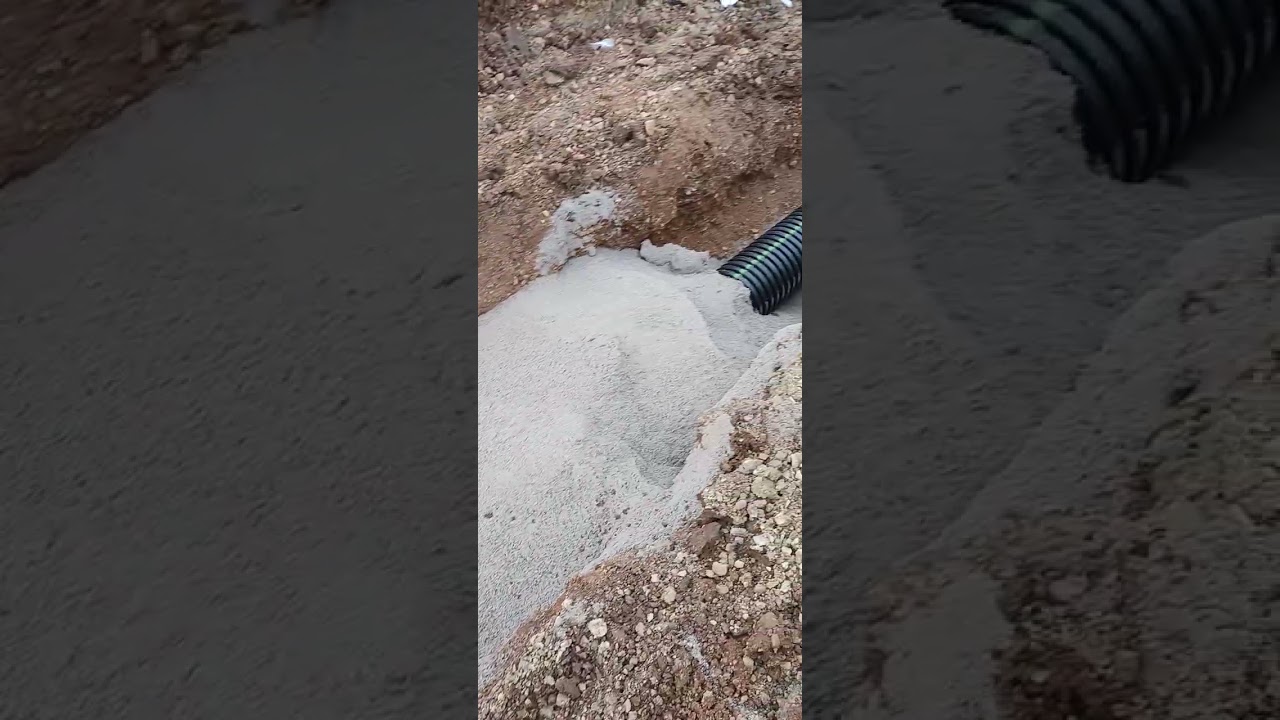 Backfilling storm drain with sand!