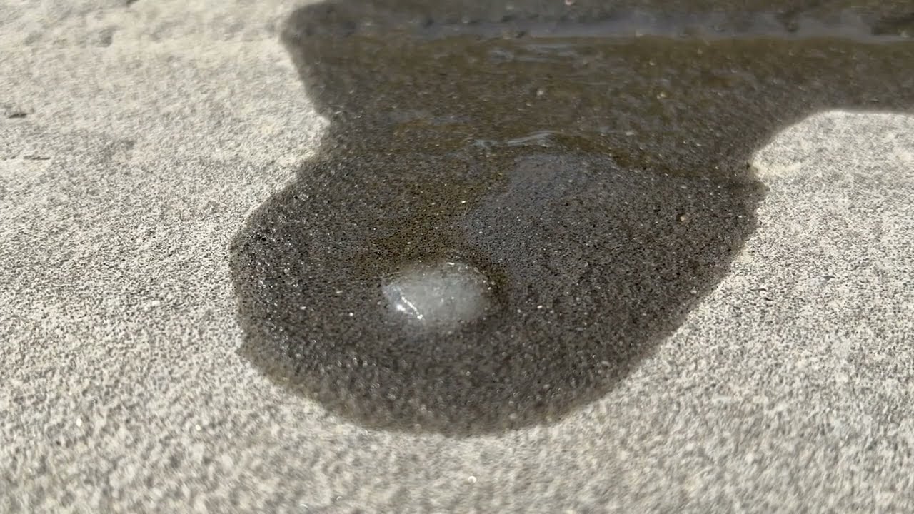 Ice cube forming in hot weather time-lapse (reverse of melting ice)