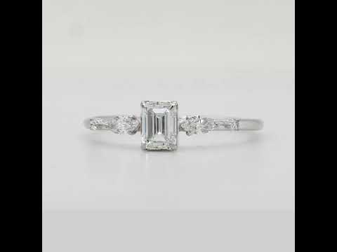 Three stone emerald cut and maquise diamond engagement ring E VS1 GIA