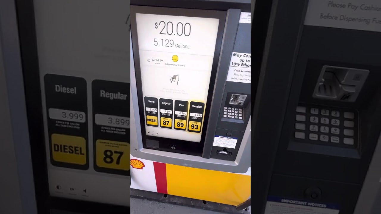 Pumping gas in gas station/shell