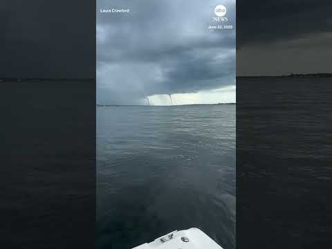 Twin waterspouts on Manatee River in Florida