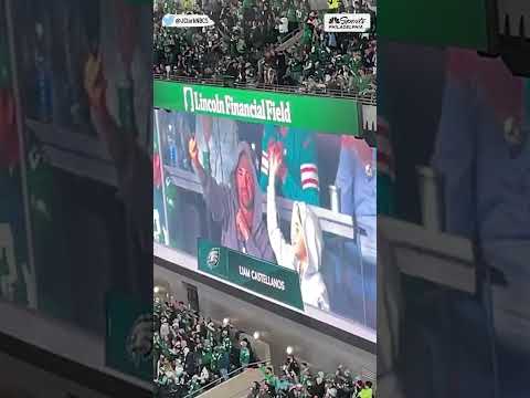 Liam and Nick Castellanos cheering on the Eagles the night before Game 6 of the NLCS