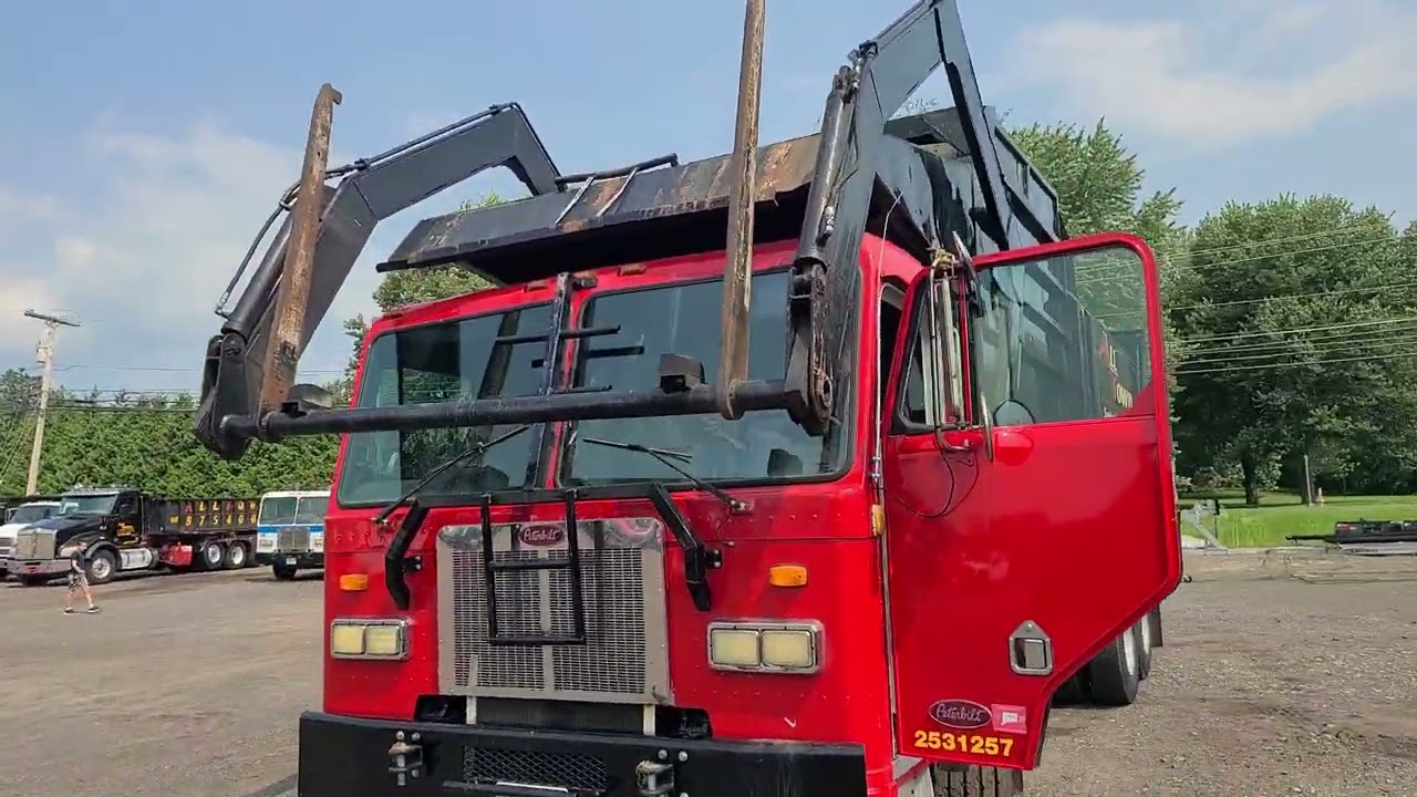 2003 Peterbilt 320 Waste Truck - $81,000