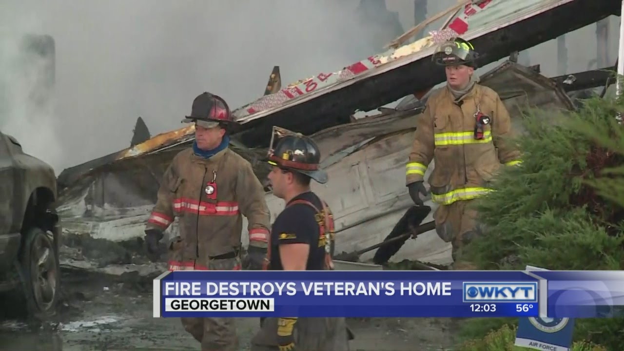 Drivers help save veteran, wife from Scott County house fire