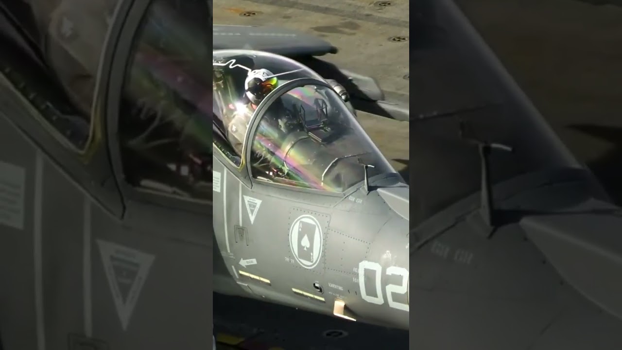 Vertical Landing Mastery: Witness the Harrier Jet Defy Gravity on an Aircraft Carrier