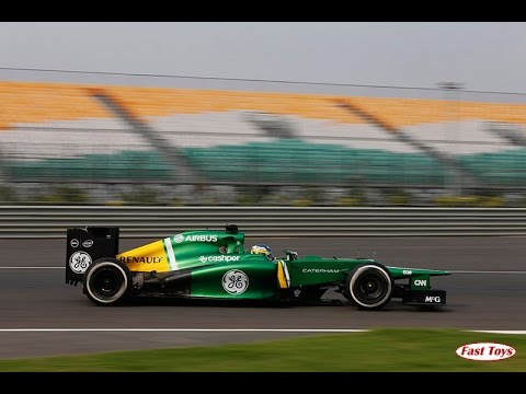 Bikini Blonde Christina Riordan Poses on Caterham Formula 1 Car ...