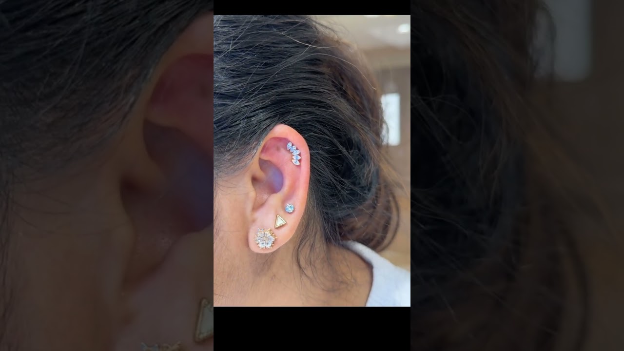 Enhance Your Style with a Trendy Helix Piercing! ✨ #helixpiercing #earpiercing #bellypiercing #dubai