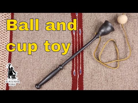 Ball and cup toy in forged iron