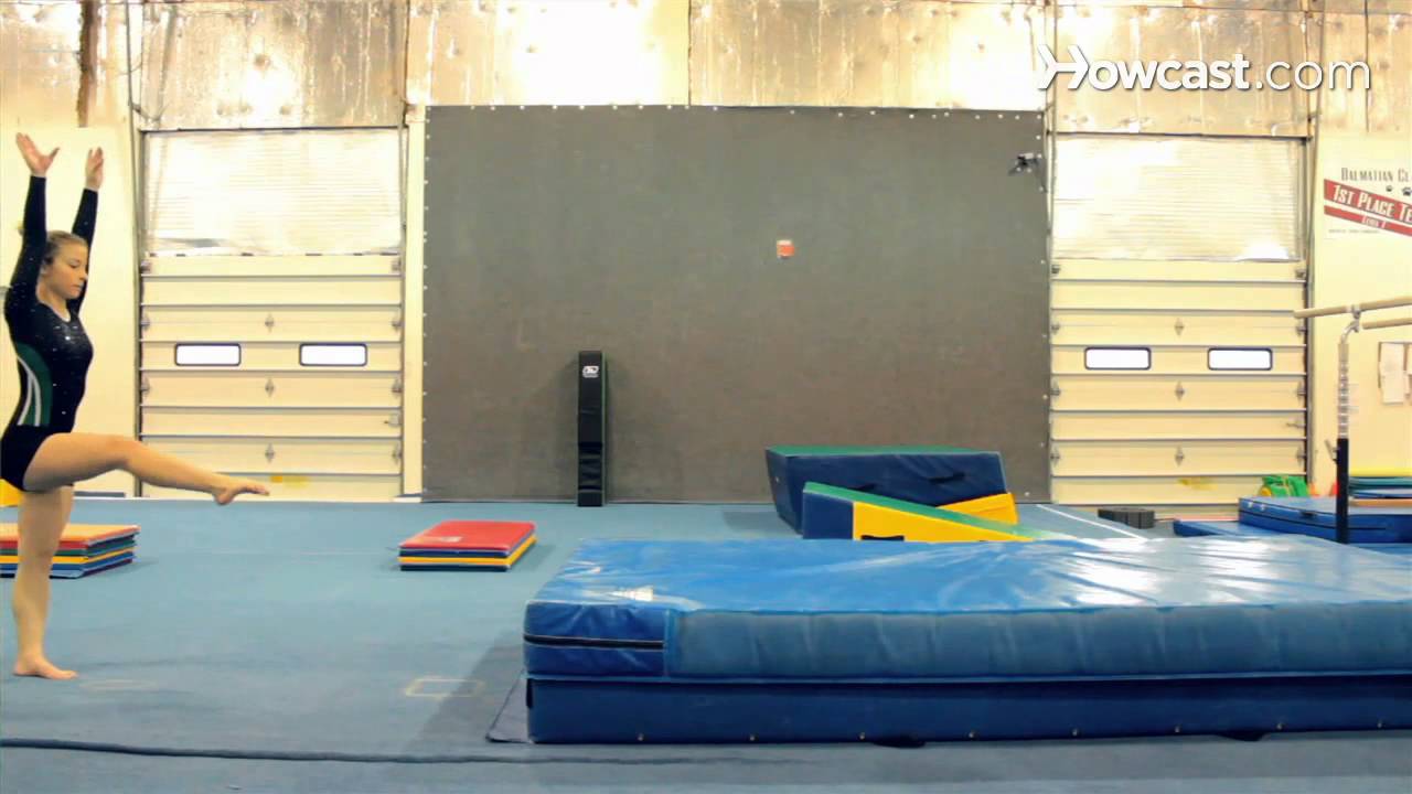 How to Do a Handstand Forward Roll | Gymnastics