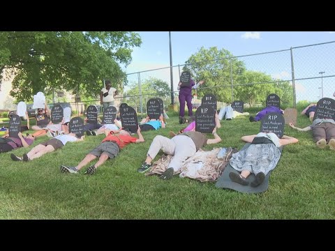 Dozens rally in Greensboro against federal health care cuts