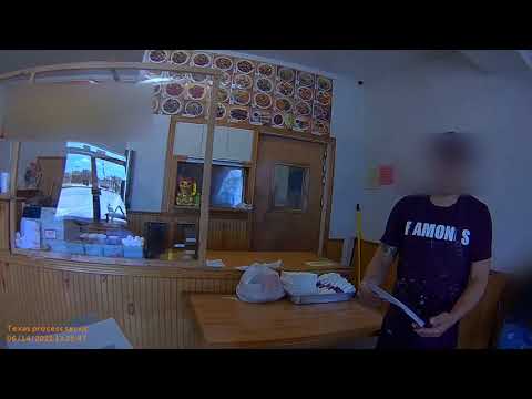 Process Server serving defendant at work.