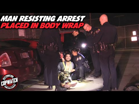 Man Resisting Arrest Placed in Body Wrap | Officer Injured | Copwatch ...