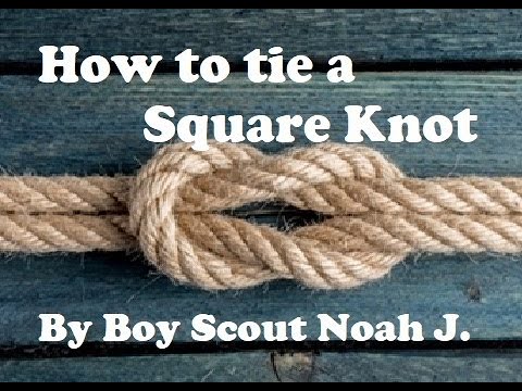 Boy Scout Ties a Square Knot