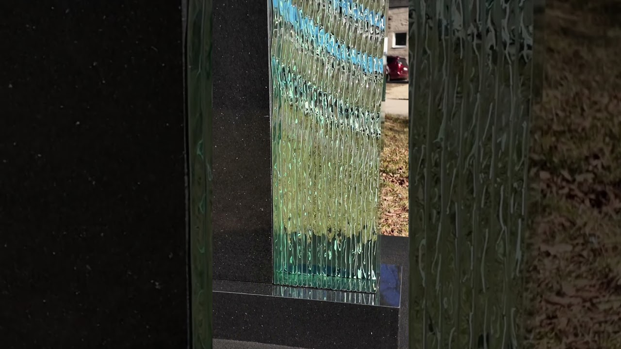 The Glass and Granite headstone.
