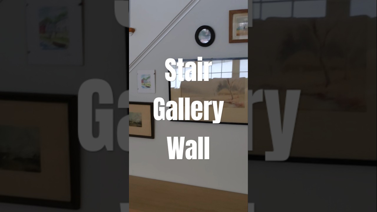 A cute little gallery wall with landscape art does the trick in this living room. #gallerywall #art