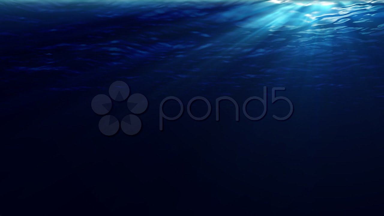 Underwater Scene With Sunrays Shining Through The Water's Surface. (Looping, Hig. Stock Footage
