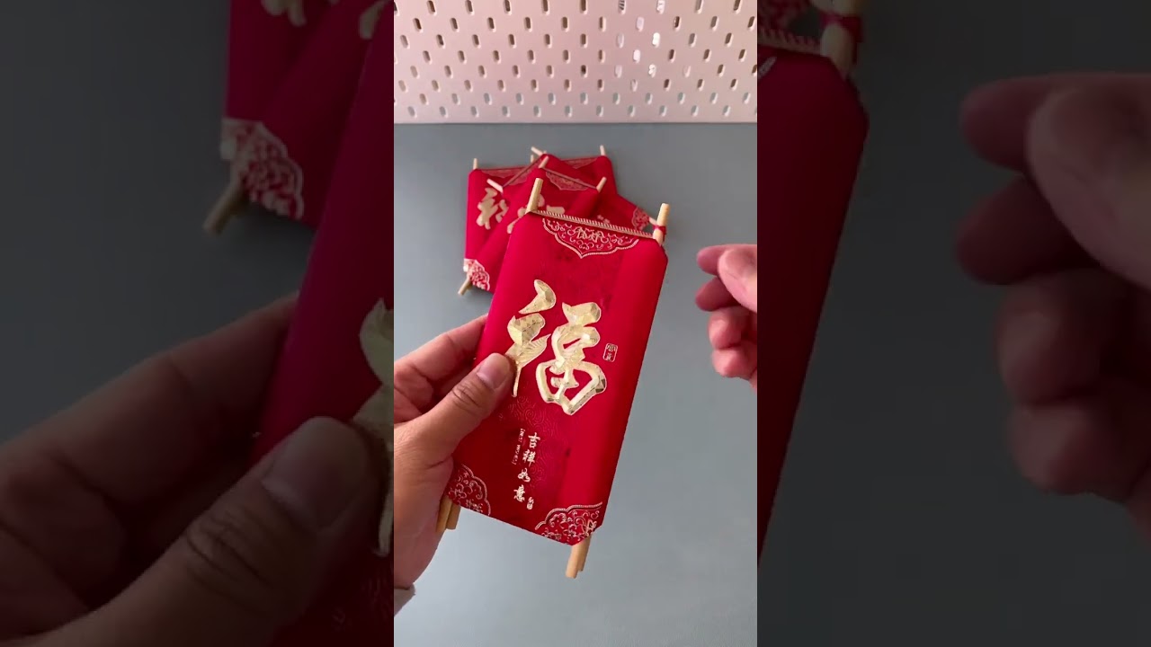 New Year is here!  Accompany your children to make a festive red envelope lantern!  New Ye