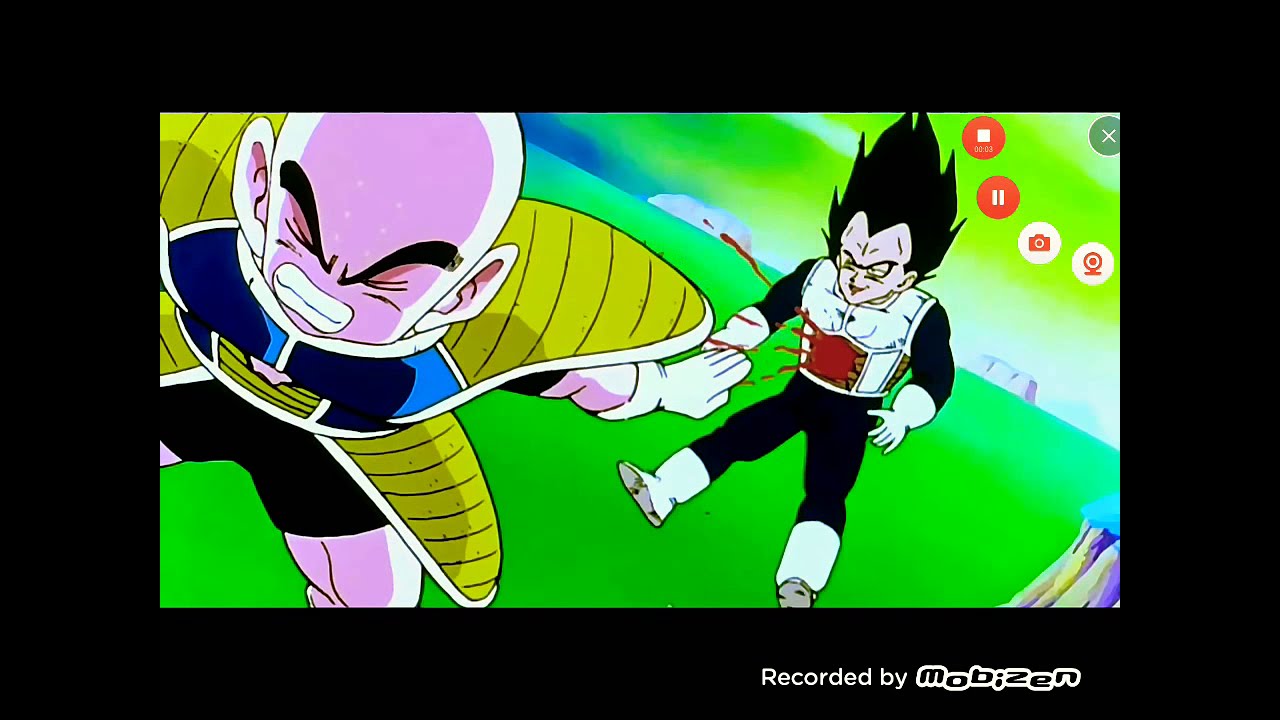 Krillin blasts Vegeta!