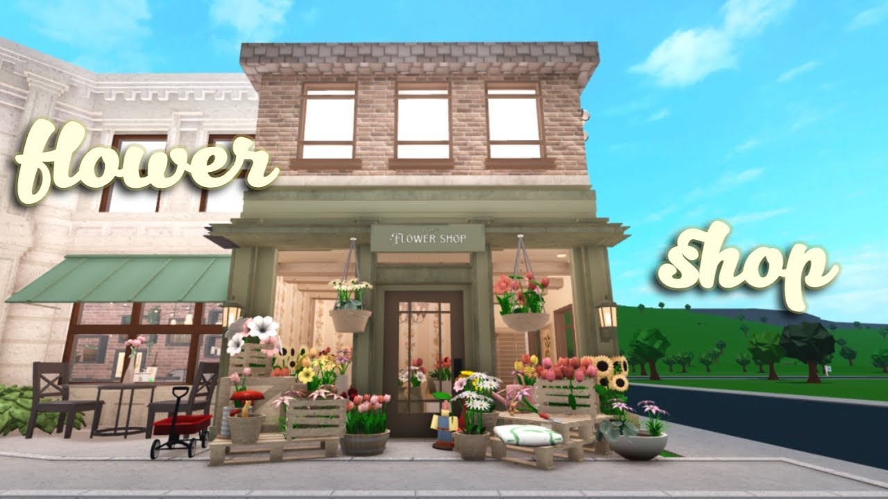 building a bloxburg FLOWER SHOP in my lakeside town