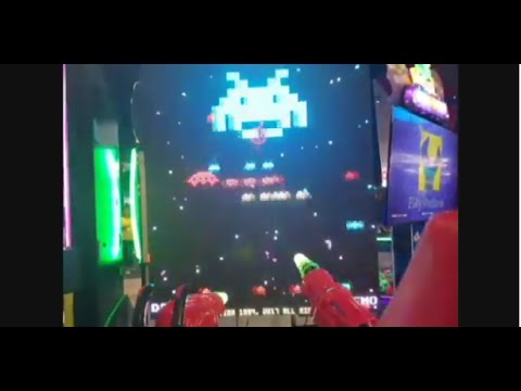 Playing Space Invaders FRENZY arcade game.