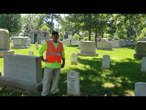 What do coins left on military headstones mean?