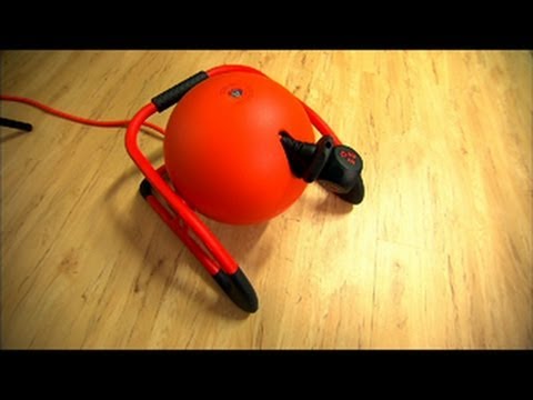 Robotic power cord coils itself