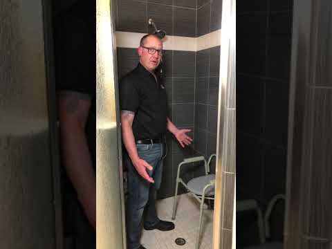 3-in-1 bedside commode in walk in shower