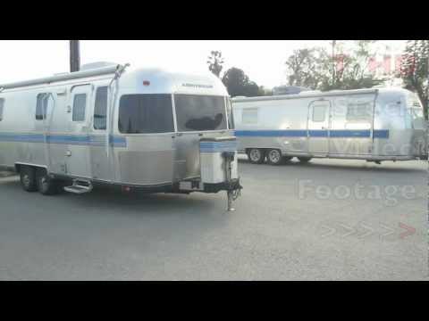 Vintage Used Airstream For Sale in Excella Travel Trailer RV Model Campers | HD Stock Video Footage