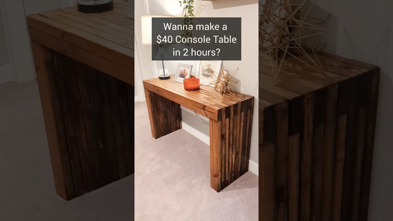 Got a hankering for a new console table and have a bunch of 2x4s laying around? Well, you're in luck