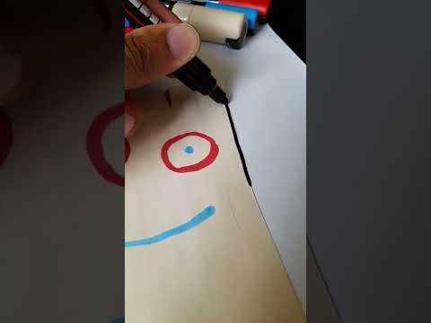 Painting on a piece of wood with Posca Markers