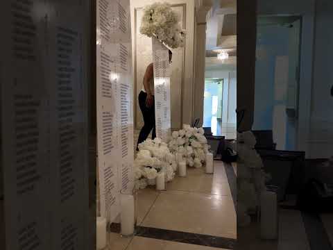 Elegant All-White Wedding Florals for a Luxe Seating Chart
