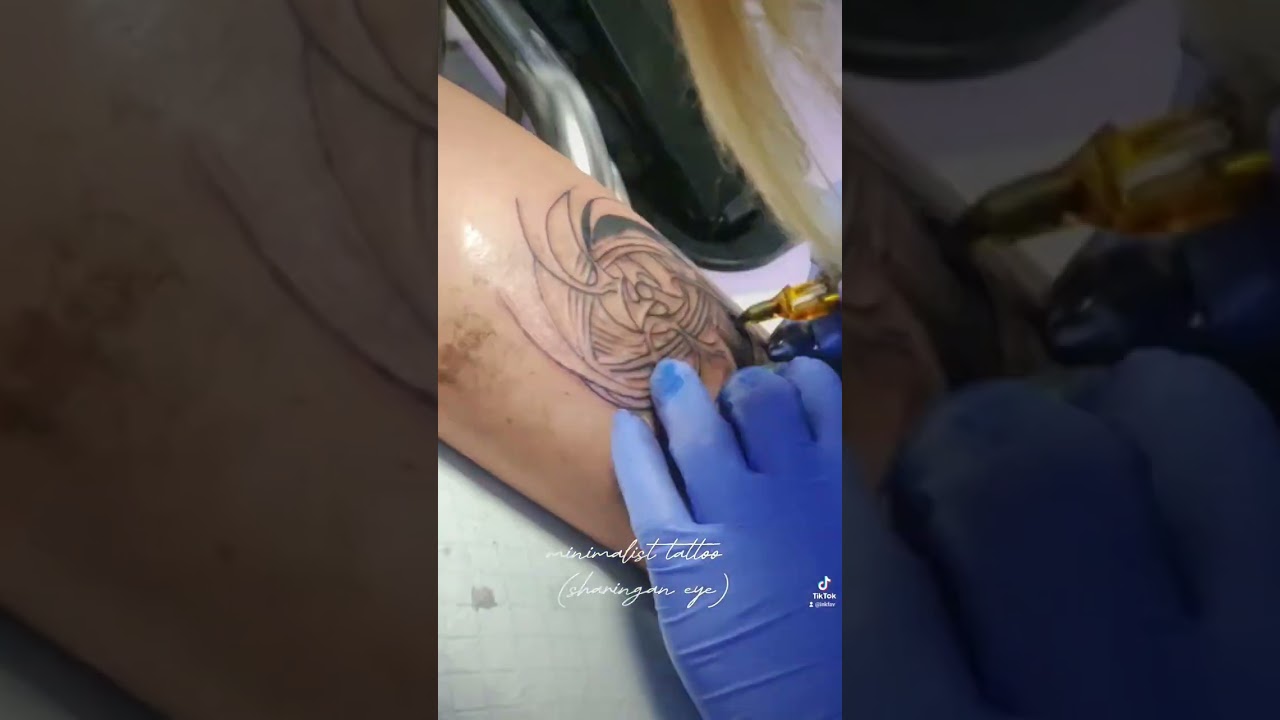 sharingan eye tattoo