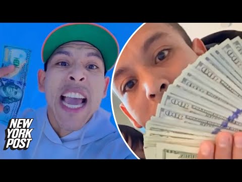 Migrant influencer Leonel Moreno waves around cash as he mocks US taxpayers who ‘work like slaves’